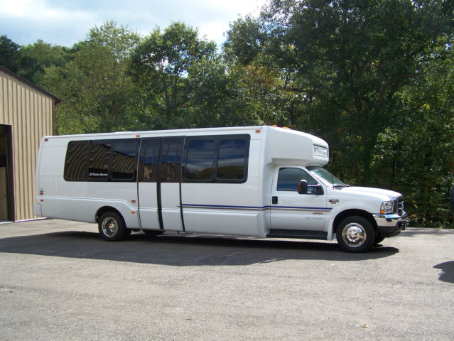 White (pair) 24 Passenger 220 Stretch SUV Limousines