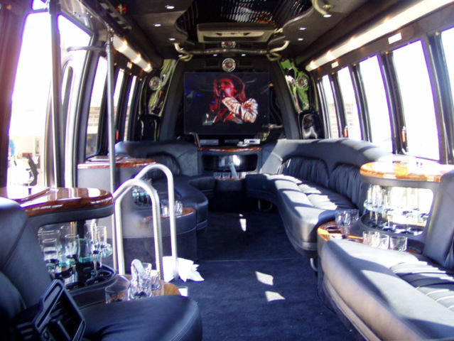 White (pair) 24 Passenger 220 Stretch SUV Limousines